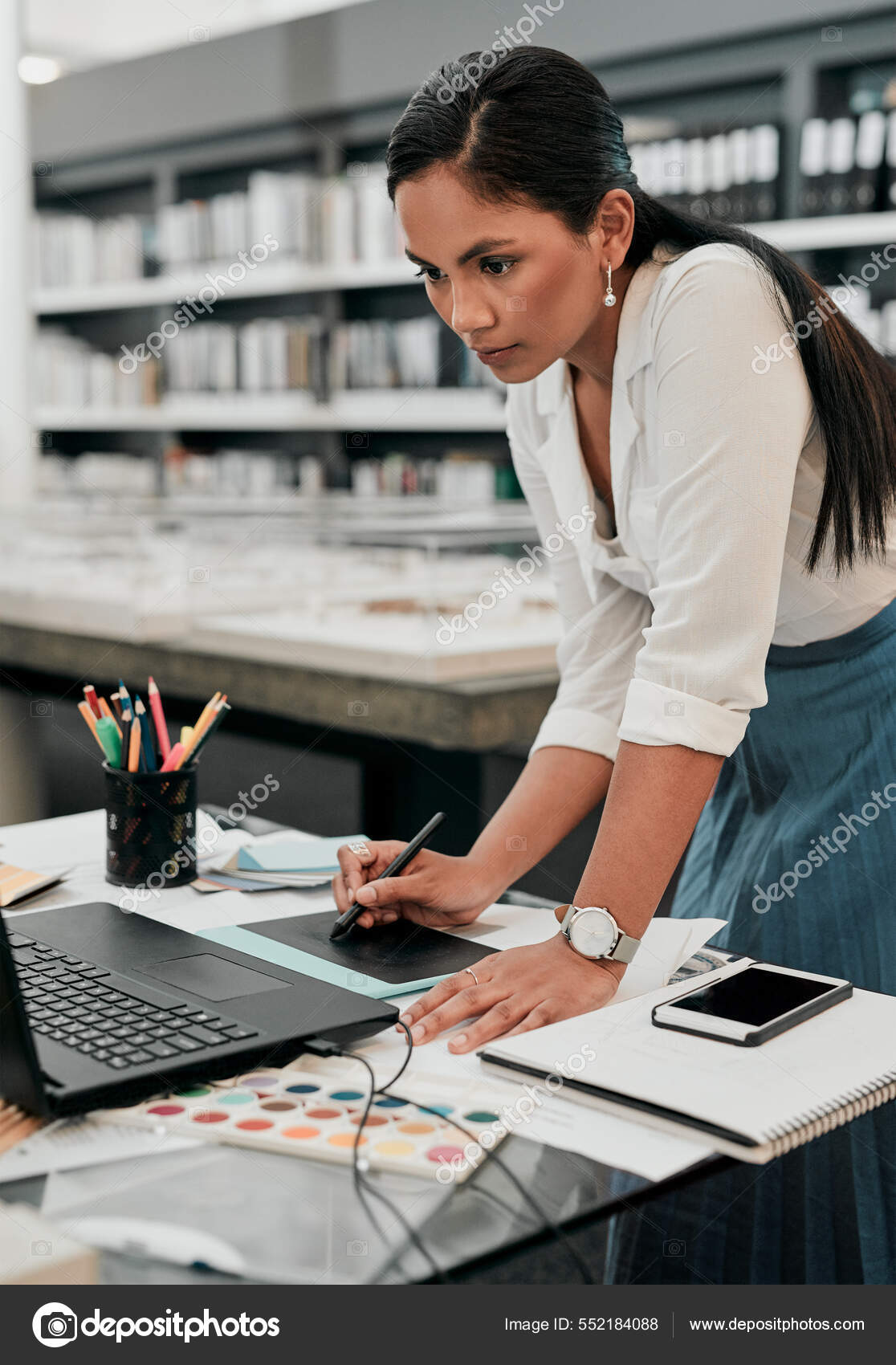 Digital technology has changed how an architect plans. Shot of a young ...