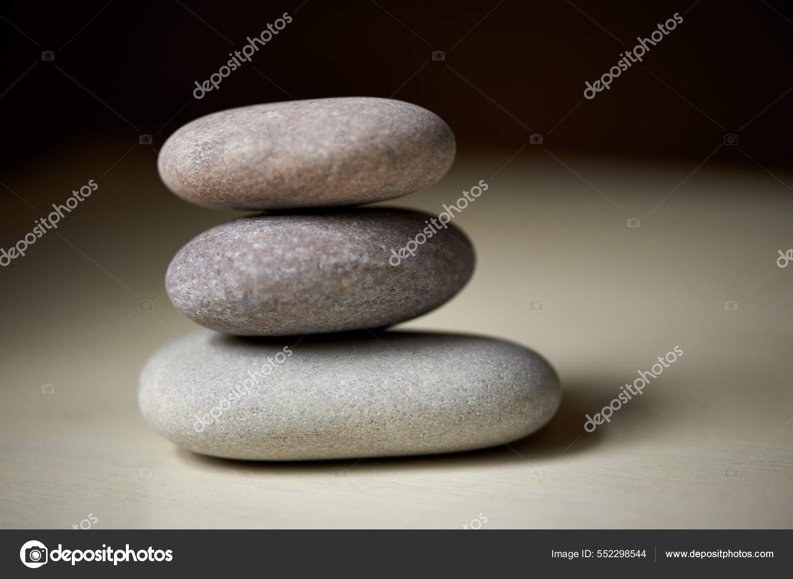 Zen balance. Three stones balanced on top of each other in natural ...