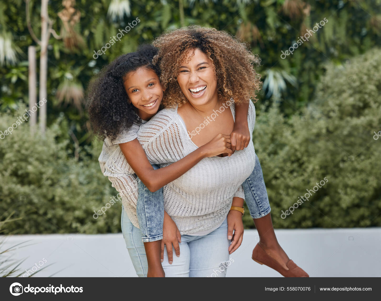 Happiness is seeing your mother smile. Shot of a mother carrying her ...