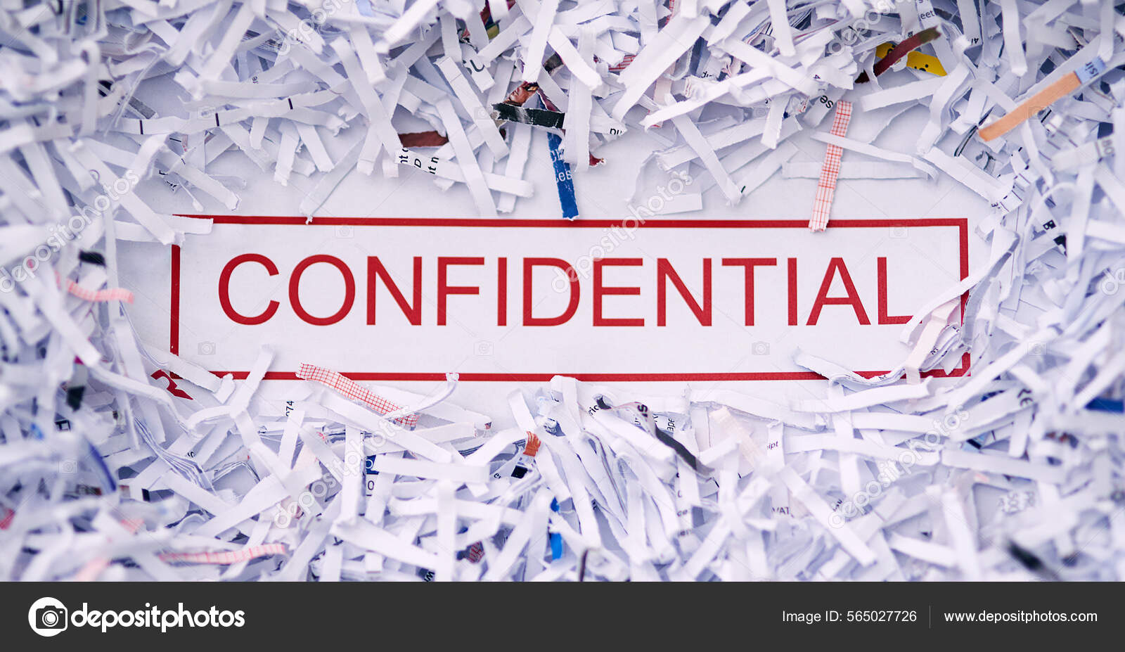 Keep it confidential. Studio shot of the word CONFIDENTIAL surrounded ...