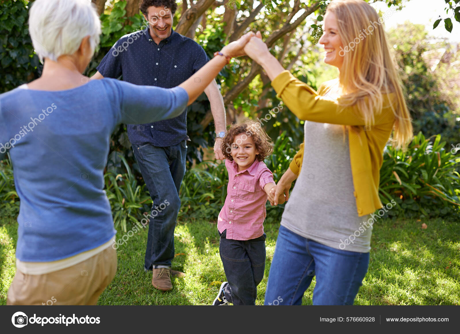 Shot Happy Multi Generational Family Playing Garden Stock Photo by ...