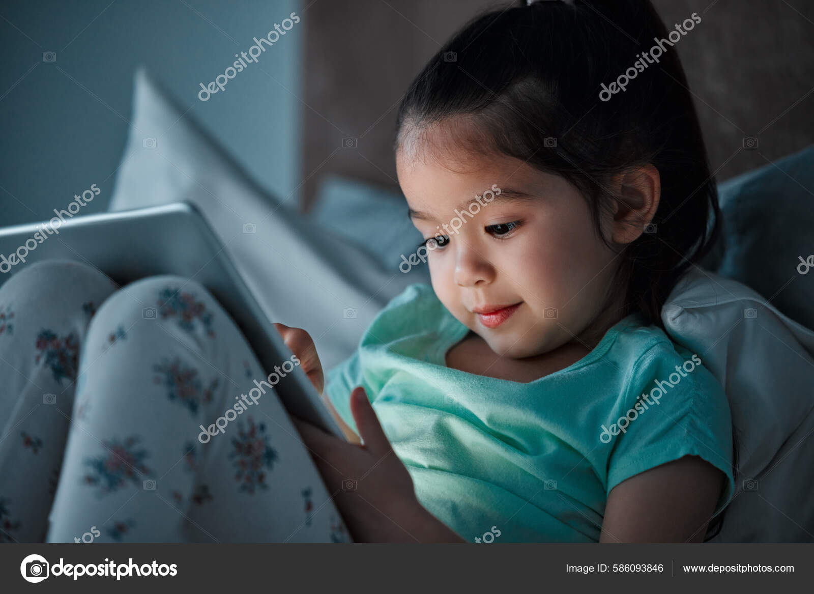 Little Girl Using Digital Tablet While Lying Her Bed — Stock Photo ...