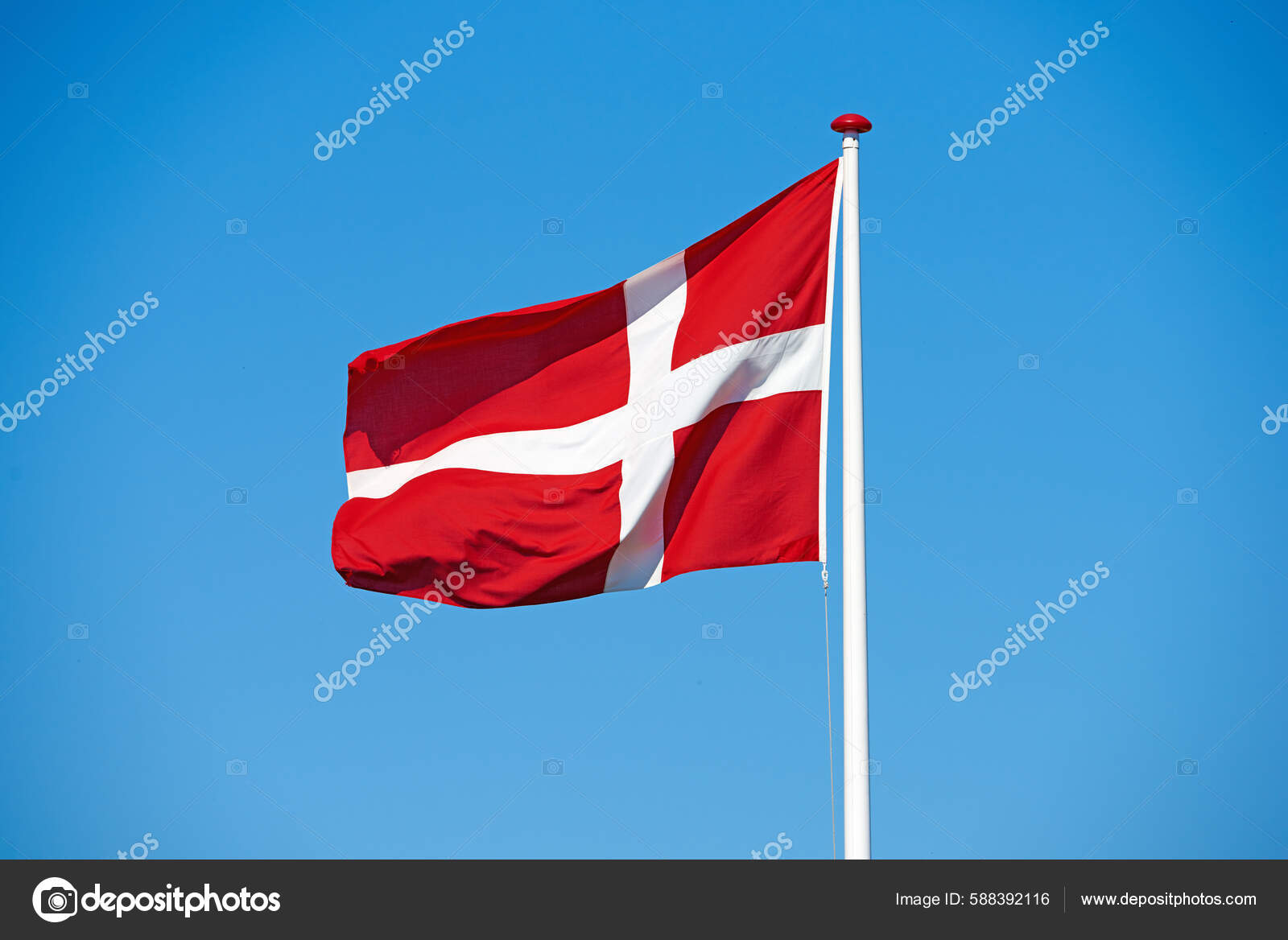Danish Flag Blowing Blue Background Stock Photo by ©PeopleImages.com ...