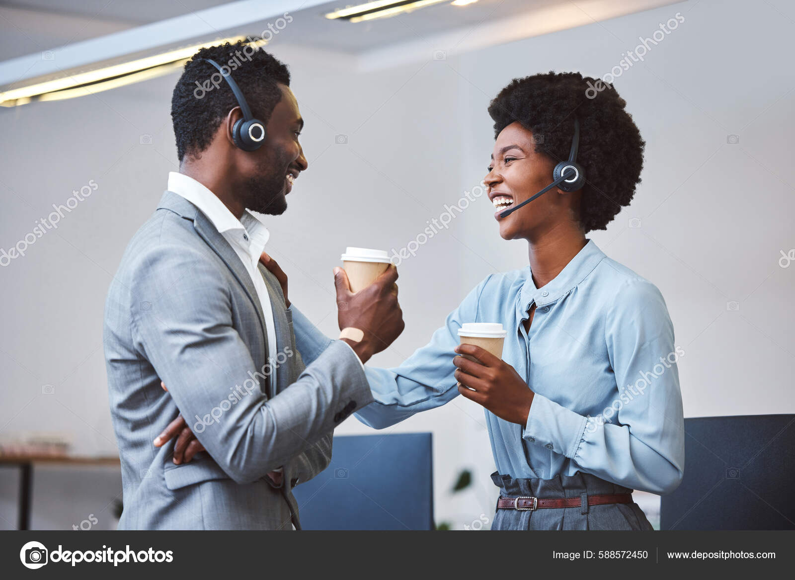 Two Happy Young African American Call Centre Telemarketing Agents ...