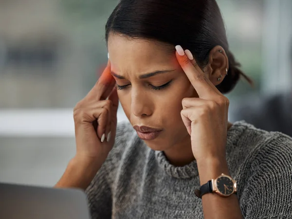 Someone give me pain pills. a young businesswoman experiencing a ...