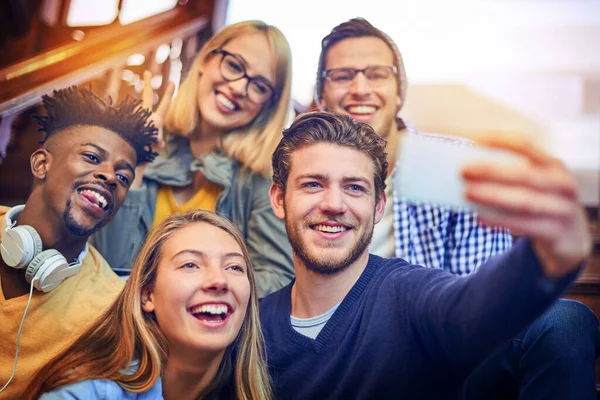 Friends on campus, friends forever. a group of diverse university ...
