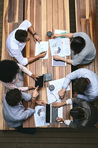 Where we all share our ideas to better the business. High angle shot of ...