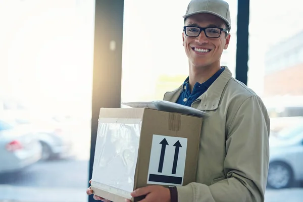 He takes full care and responsibility for every package. Portrait of a ...