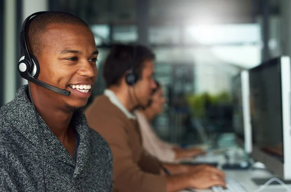 Theres no issue they cant help you resolve. a call centre agent working ...