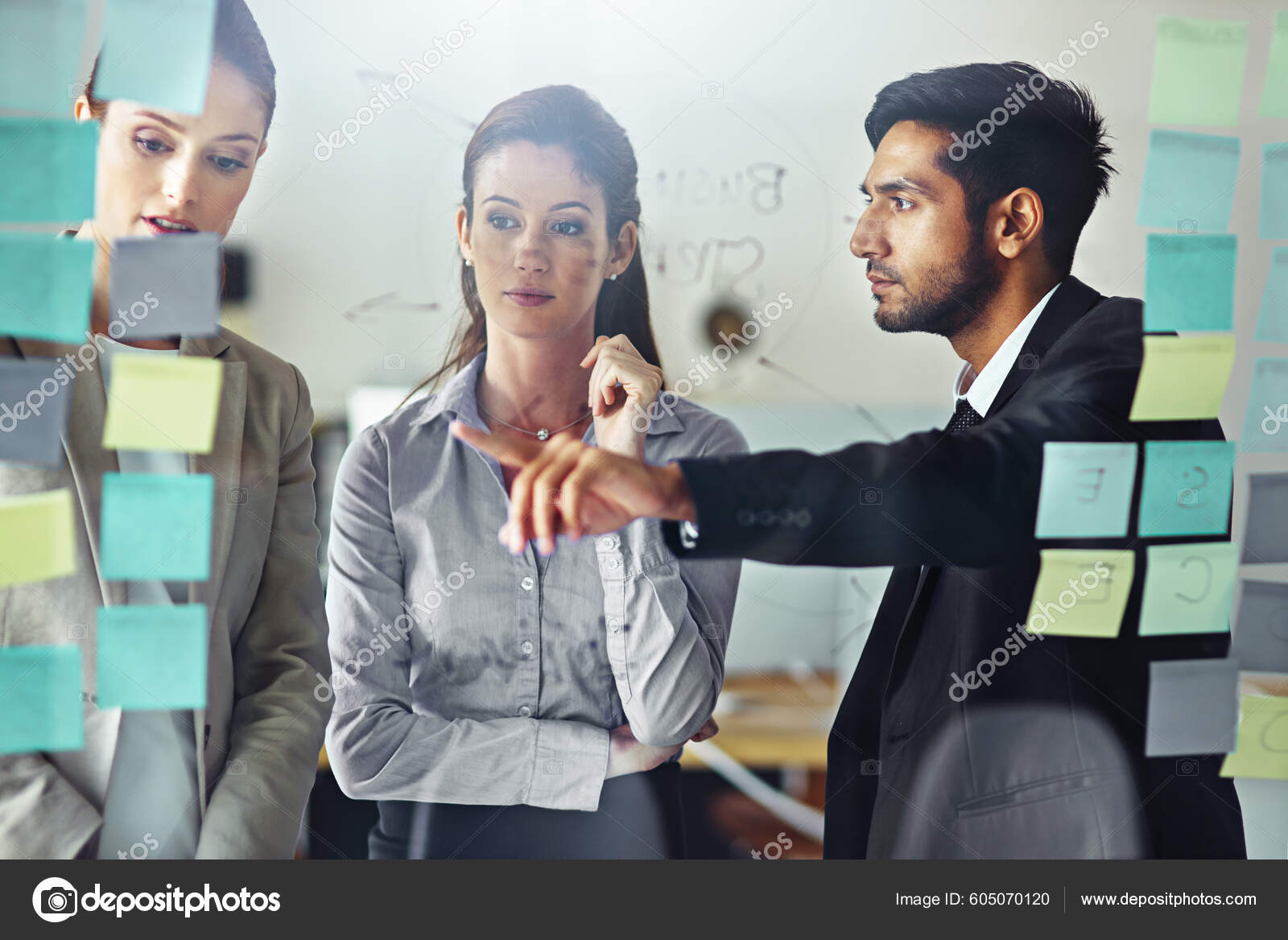 Interesting Point Group Businesspeople Brainstorming Glass Wall Sticky ...