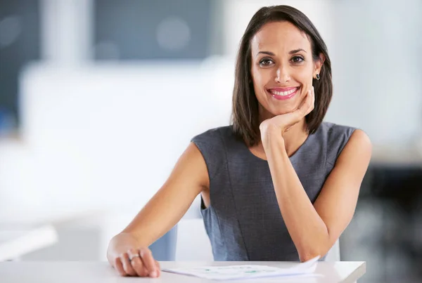 Shes a portrait of corporated success. Portrait of a smiling young ...