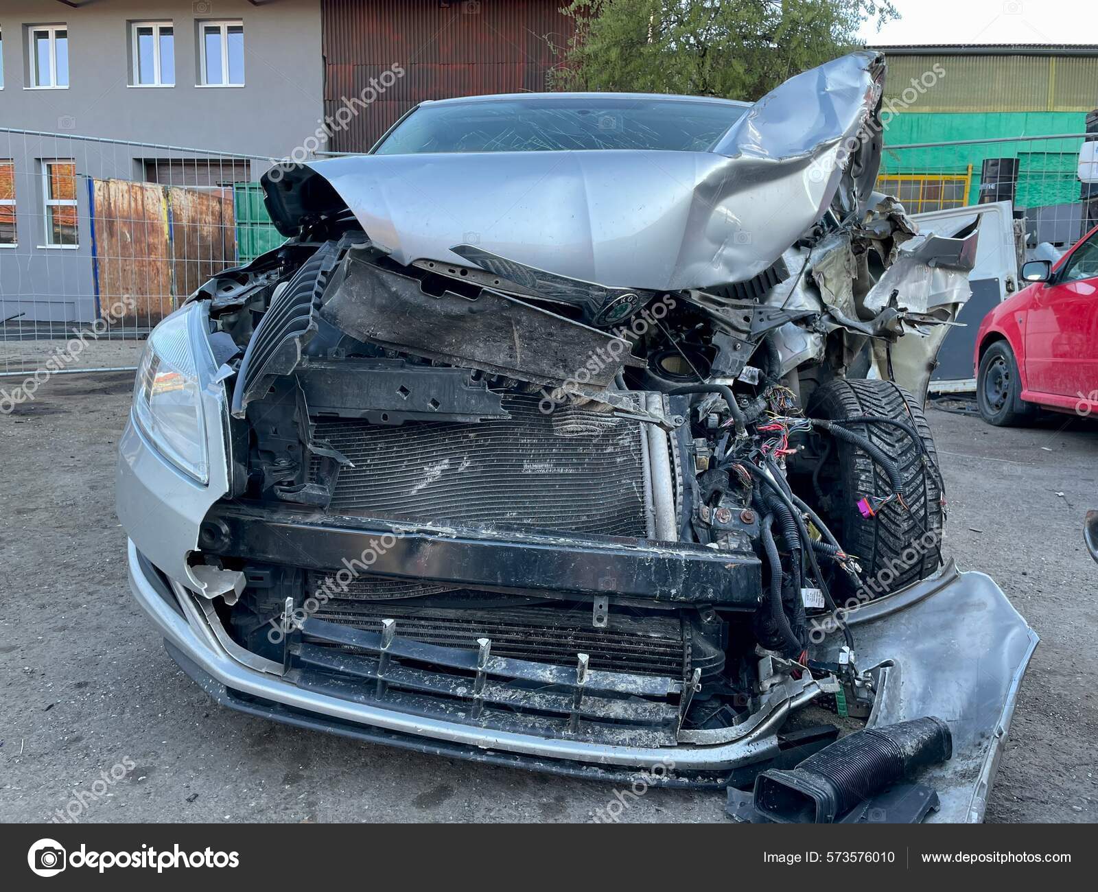 Badly Dented Car Side View Of A Car With A Badly Damaged Front End" By