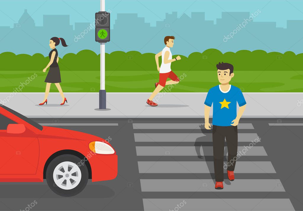 Joven cruzando la calle en el cruce con semáforos. Mira a ambos lados ...