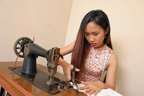 Sewing deped tuesday uniform for female Stock Photos, Royalty Free ...