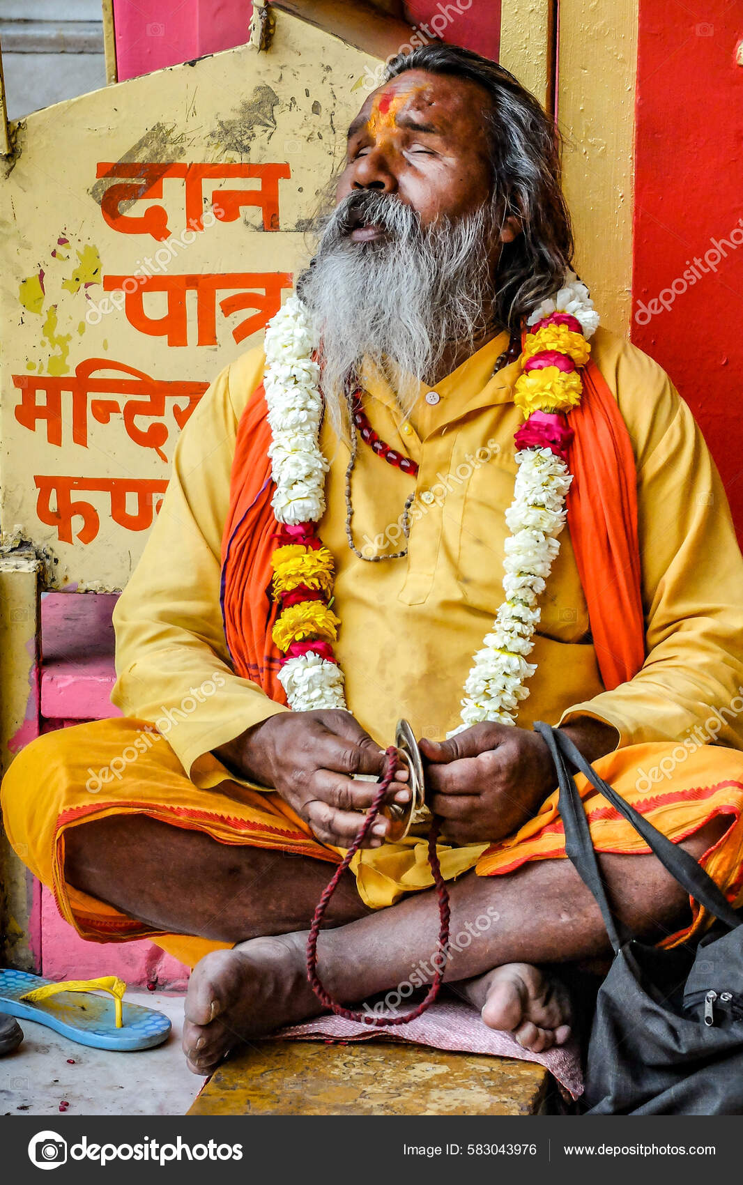 Religious Devotee Wearing Garland Flowers Sits Chants Plays Indian Hand ...