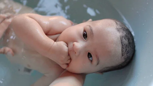 Baby asian bathing Stock Photos, Royalty Free Baby asian bathing Images ...