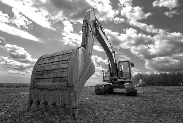 Black and white excavator Stock Photos, Royalty Free Black and white ...