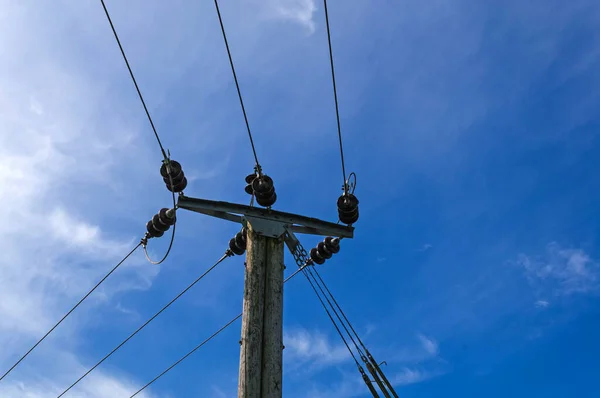 Wooden power pole, high voltage electricity, power supply and demand ...