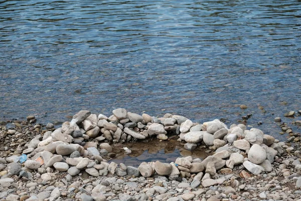 Rocks along the river formed in a circle located in Blangpidie ...