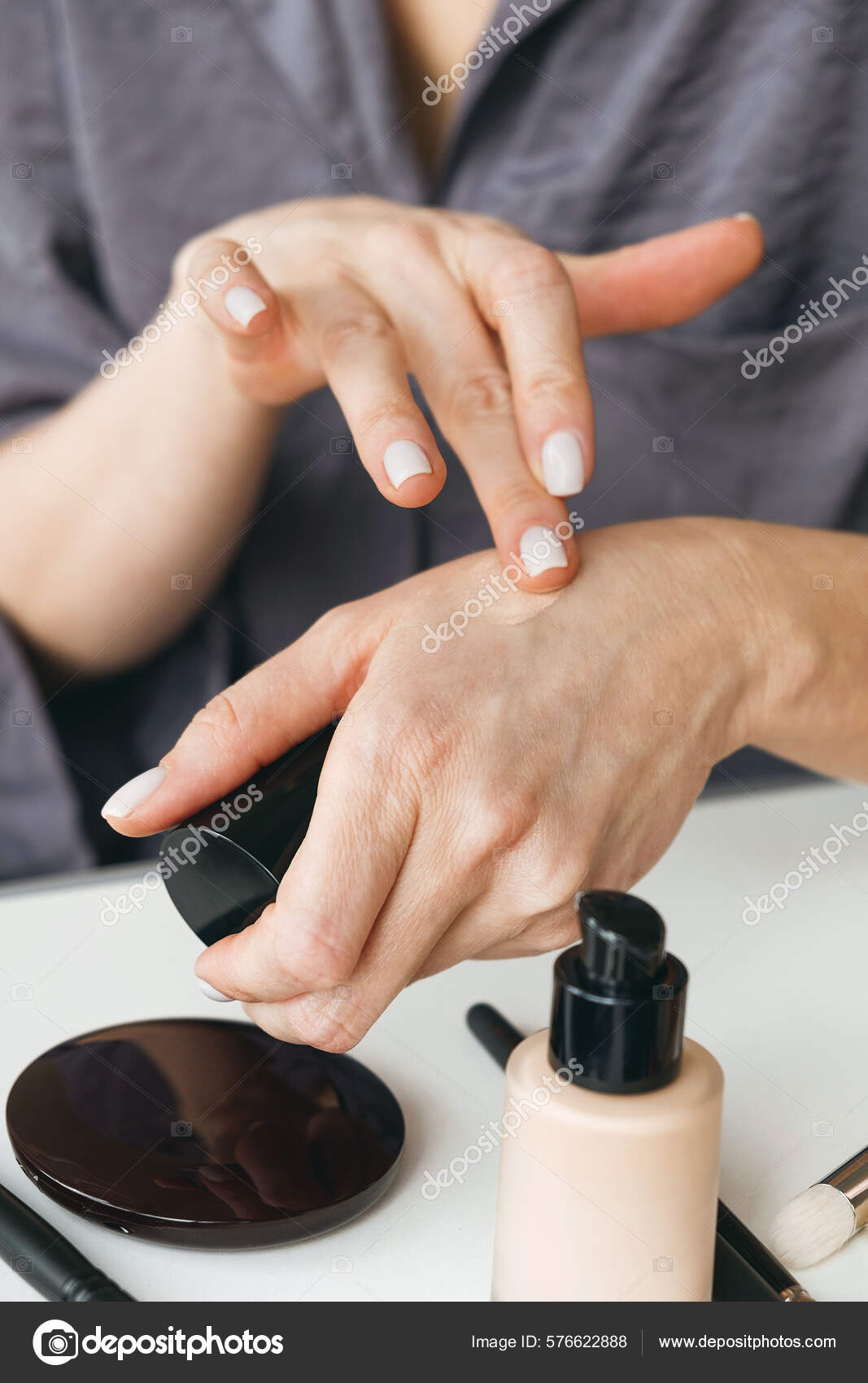 Woman Makeup Using Foundation Applying Cream Hand Vertical Close Hand ...