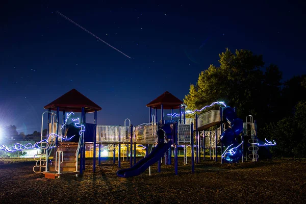 Playground at night Stock Photos, Royalty Free Playground at night ...