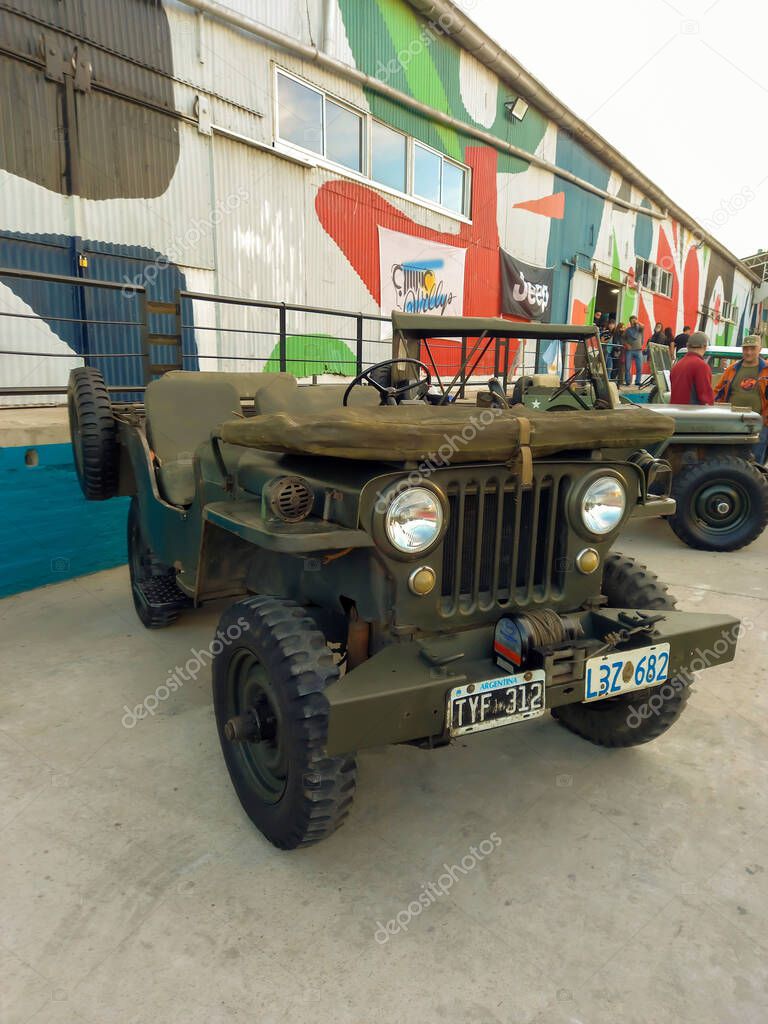 Old green military Jeep Willys MC or M38 1940s with winch in a ...