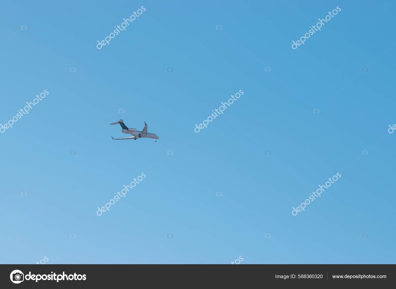 Airplane Flying Blue Sky — Stock Photo © wirestock_creators #588360320