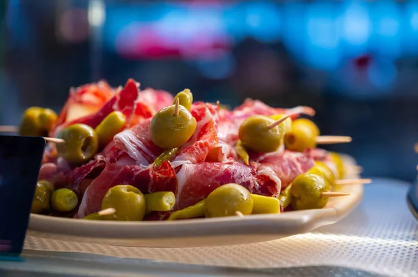 Typical snacks of Basque Country and Navarre, pinchos or pinxtos on ...