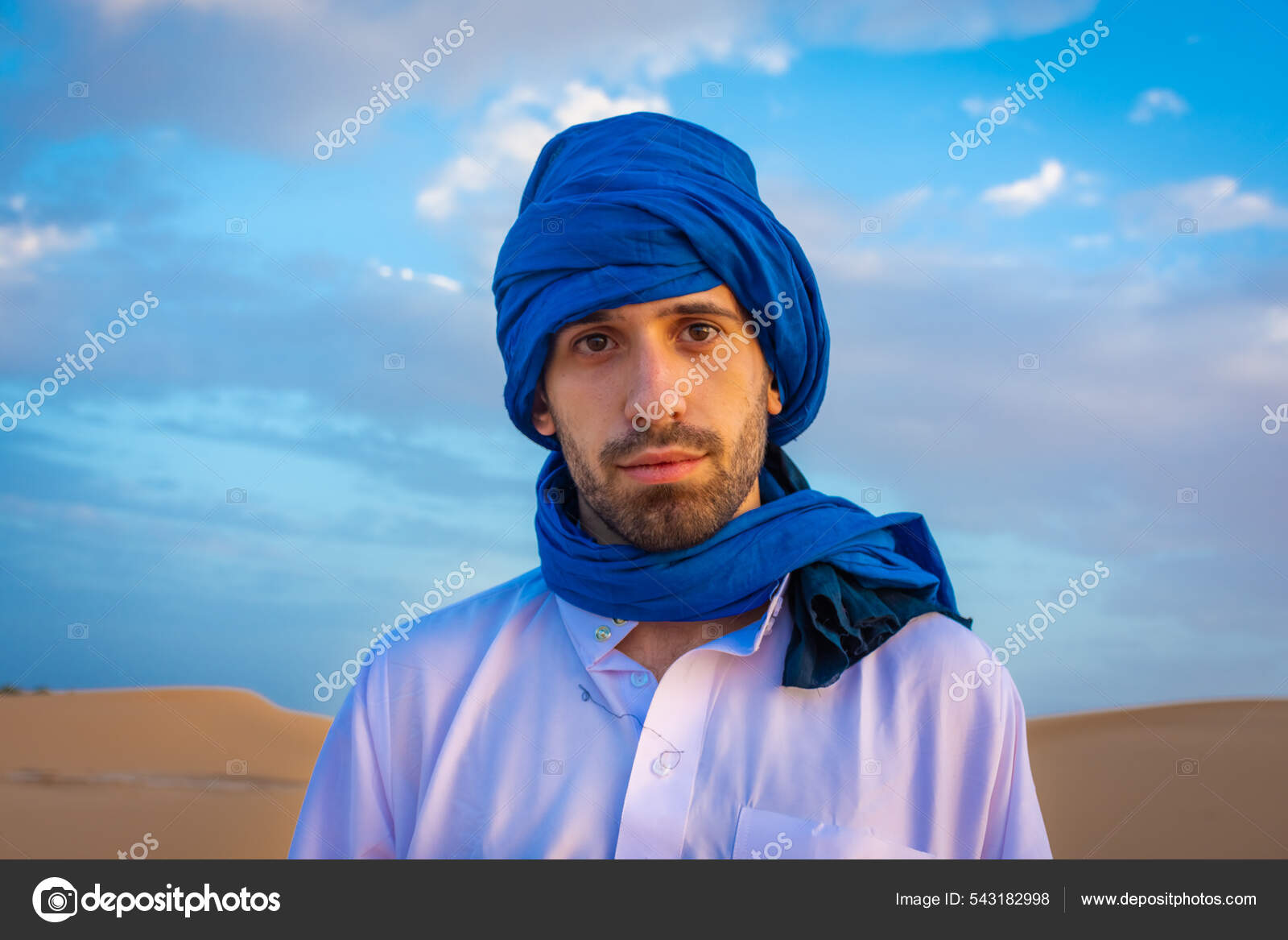 Young Arabic Man Wearing Traditional Berber Clothes Sahara Desert ...