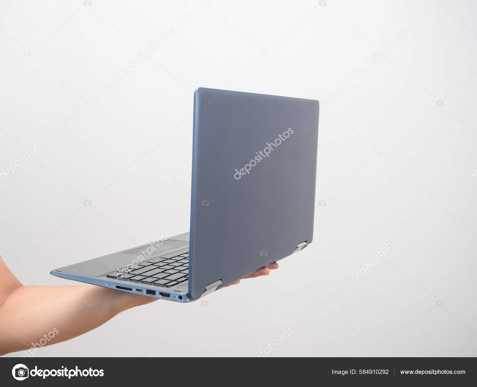 Close Hand Holding Laptop Isolated White — Stock Photo © ToffeePhoto ...