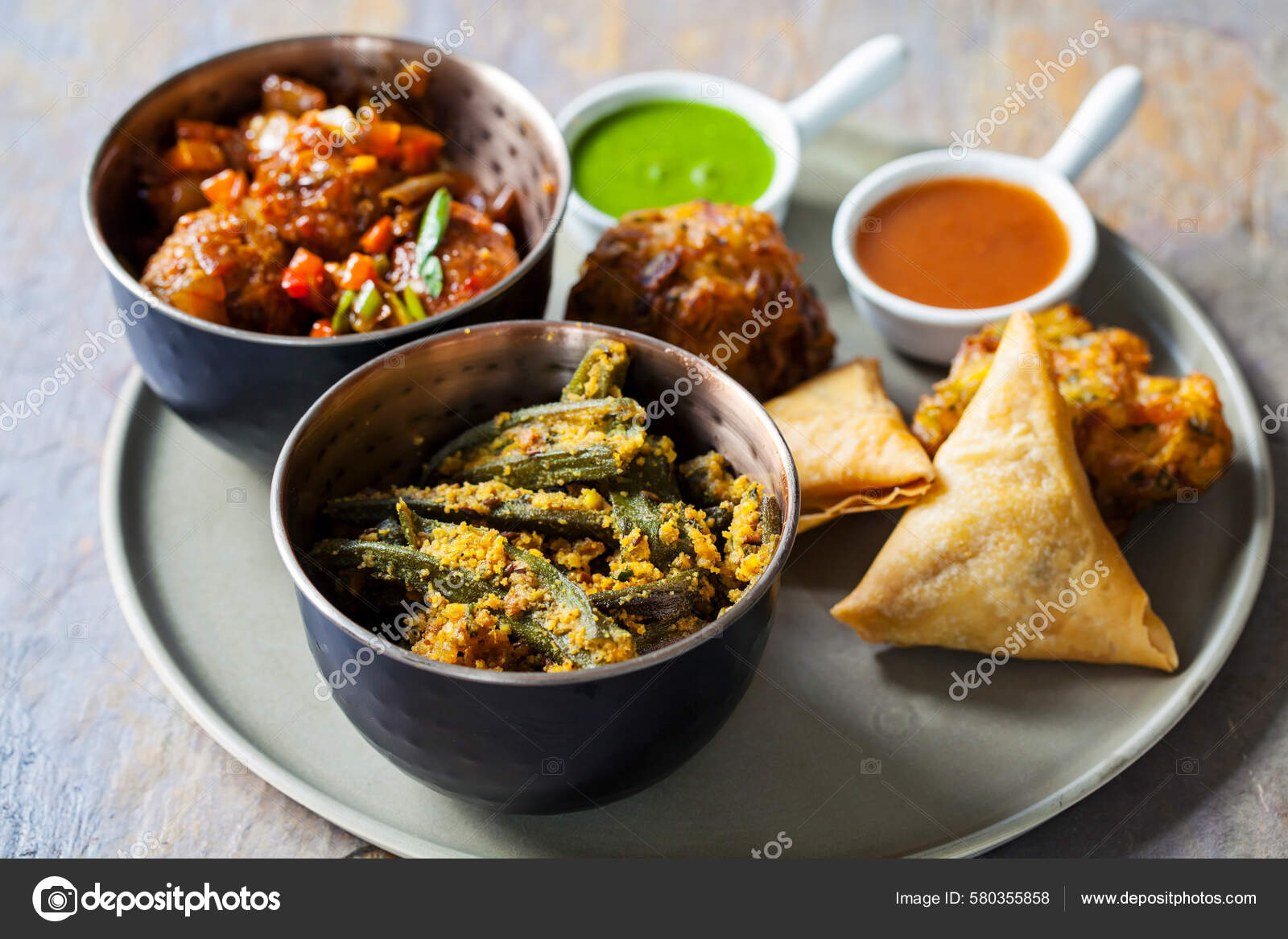 Selection Indian Dishes Samosas Onion Bhaji Manchurian Balls Okra Stock ...