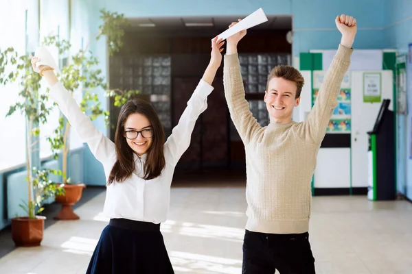 Happy students celebrating end of the studying year and successful ...
