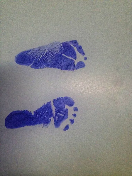 Feet and hand prints Stockfotografier, royaltyfria Feet and hand prints ...