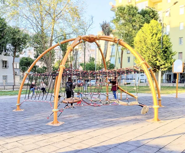 Kids playing in a playground landscape fotos de stock, imágenes de Kids ...