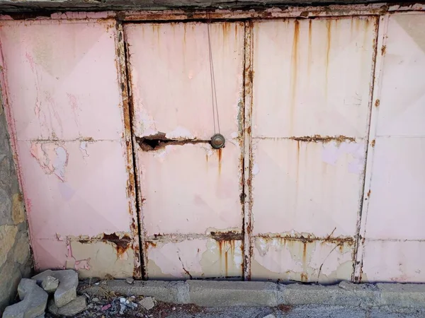 Rusted door. Broken, old, run-down iron door. - Stock Image - Everypixel