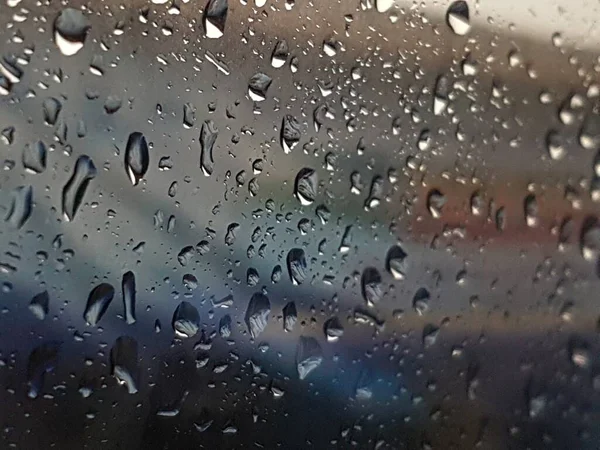 Water droplets on surface of car glass window. Car wash concept ...