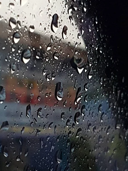 Water droplets on surface of car glass window. Car wash concept ...