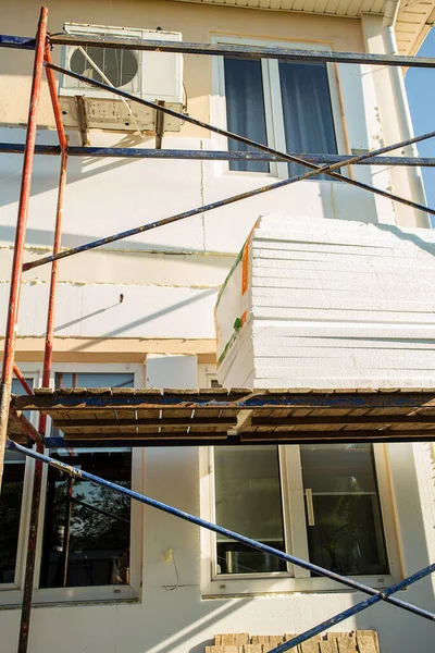 Modern repair and reconstruction of the house. Insulation of the house ...