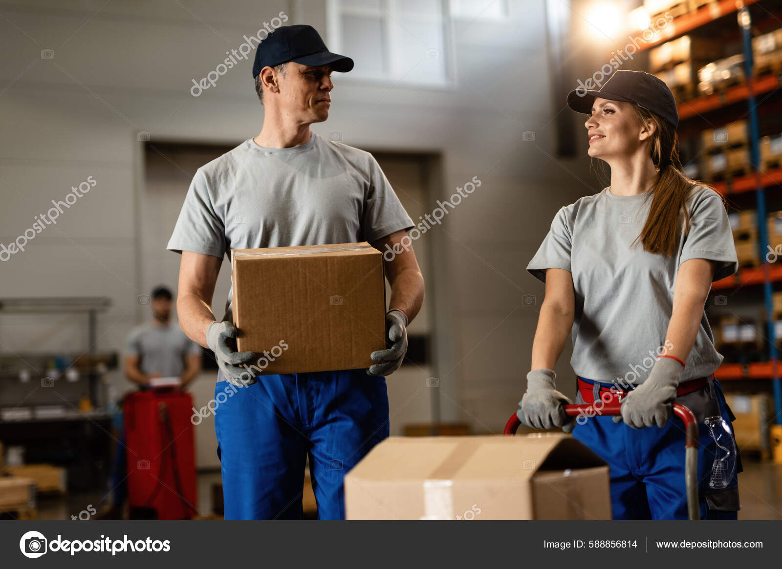 Two Happy Coworkers Communicating While Working Packages Distribution ...