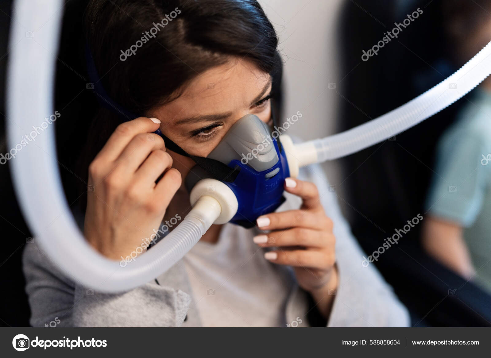 Female Patient Putting Oxygen Mask While Having Treatment Hyperbaric ...