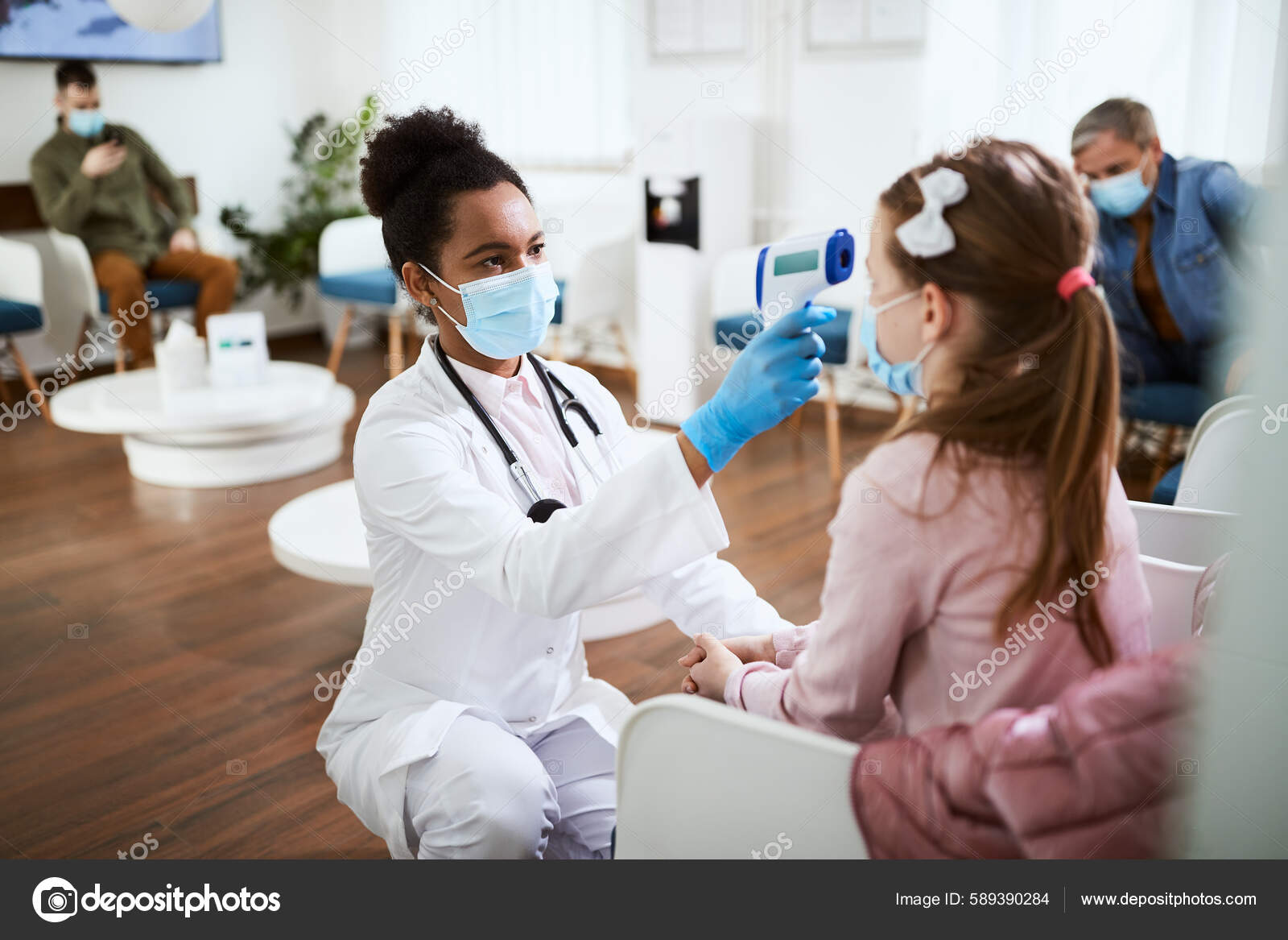 Black Doctor Using Infrared Thermometer Measuring Temperature Her Small ...
