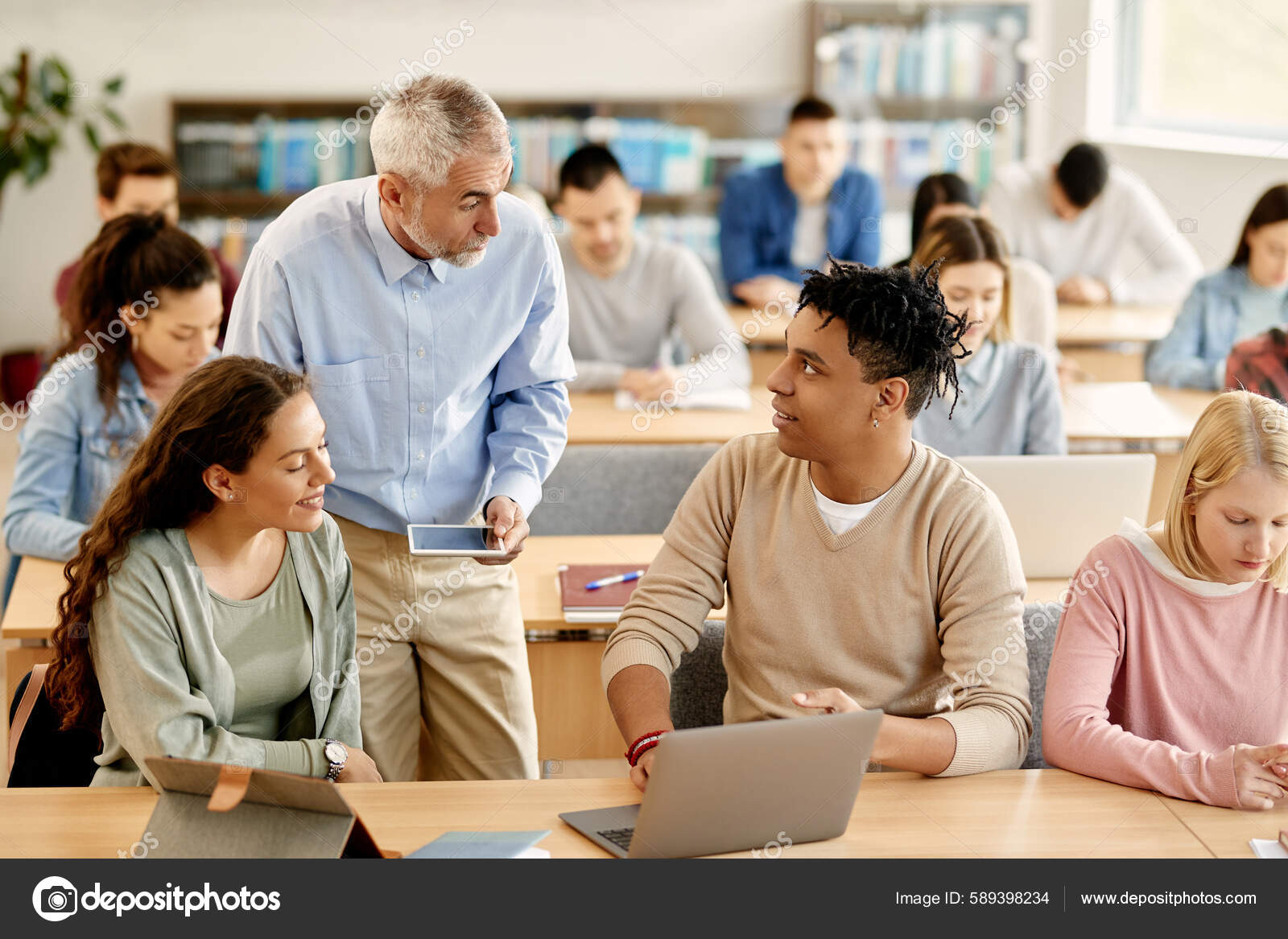 College Professor In Lecture Hall