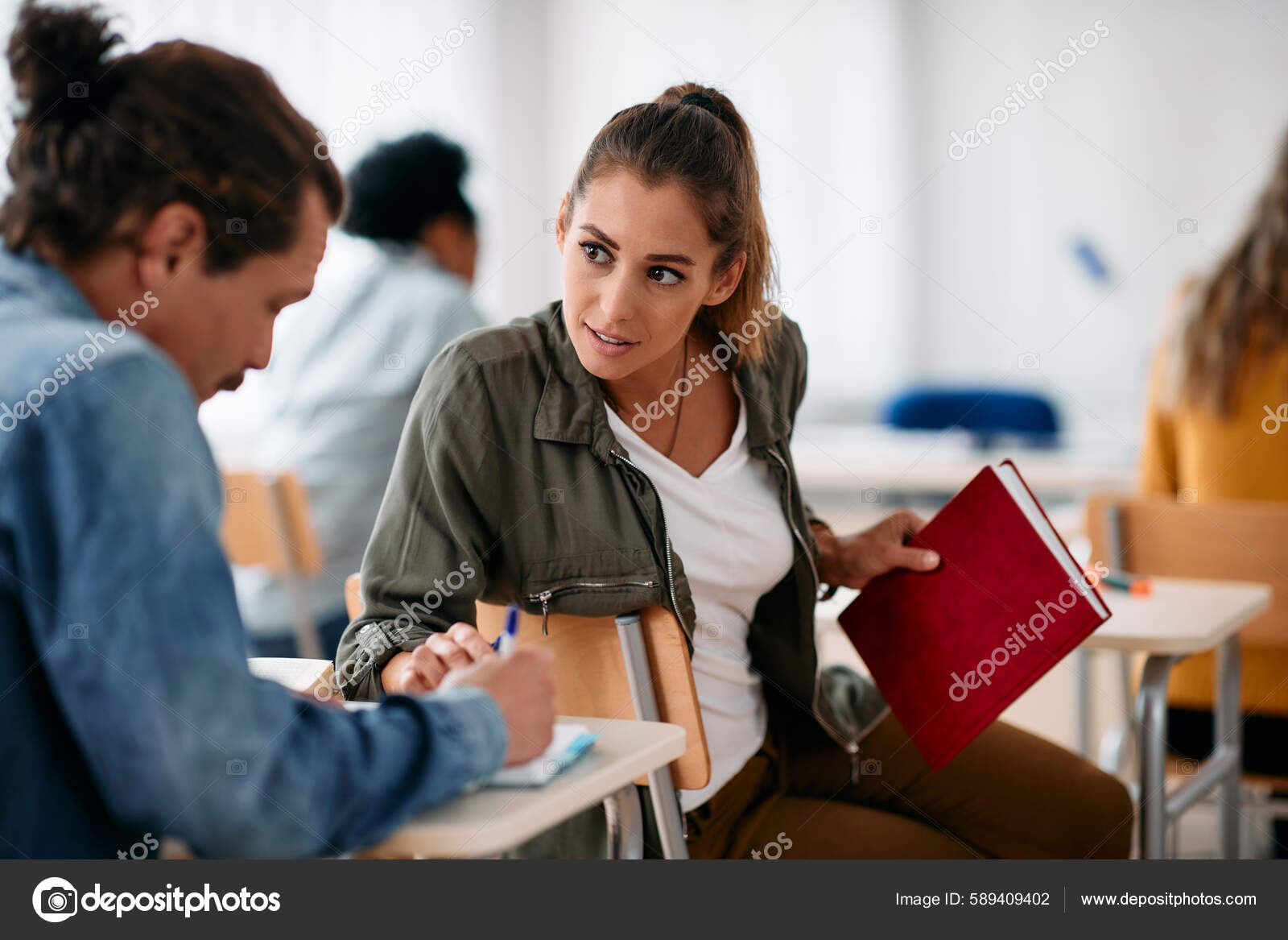 Female Student Talking Her Classmate While Having Class Lecture Hall ...