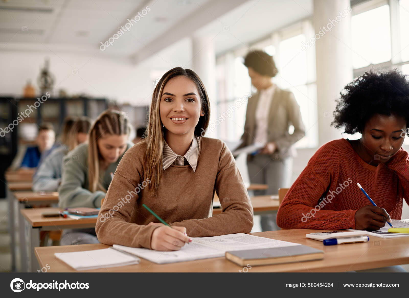 Happy Female Student Writing Her Notebook Class Classroom Stock Photo ...