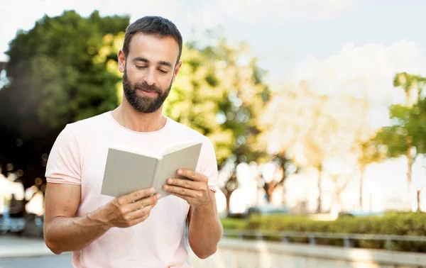 Man reading brochure Stock Photos, Royalty Free Man reading brochure ...
