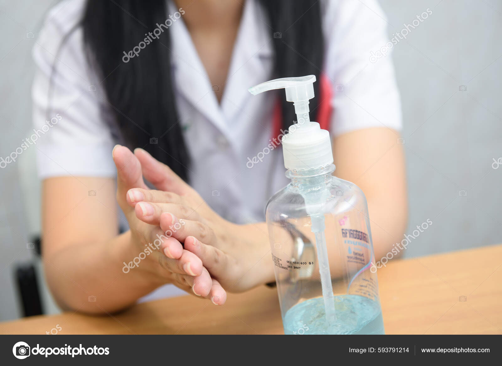 Medical Doctor Using Sanitizer Dispenser Stock Photo by ©Otakesang ...