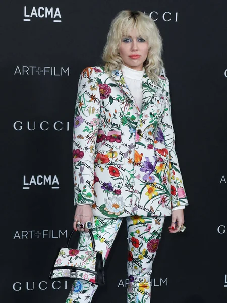 Singer Miley Cyrus Wearing Gucci Balenciaga Suit Jared Lehr Jewelry ...