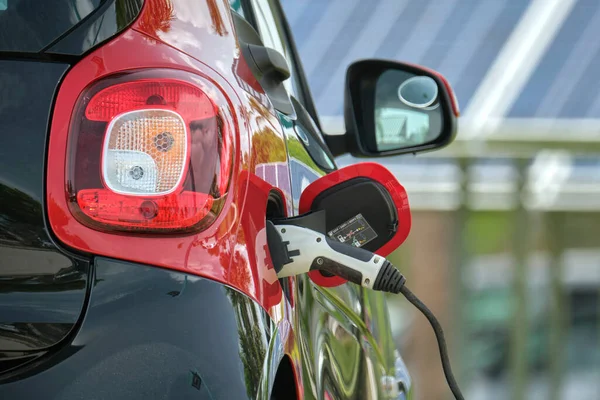 Electric plug-in car charging with electricity from solar renewable ...
