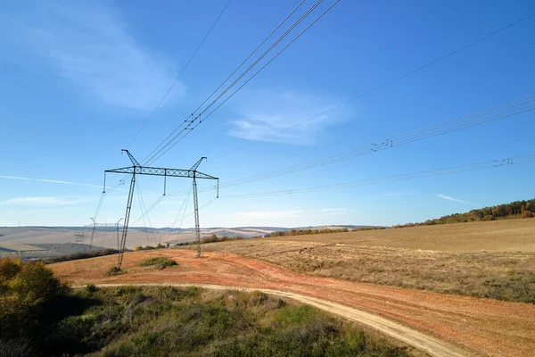 High voltage tower with electric power lines transfening electrical ...