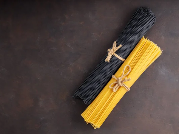 Black and gold spaghetti Stock Photos, Royalty Free Black and gold ...